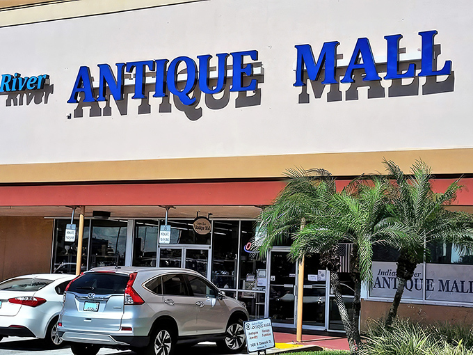 Indian River Antique Mall's bright blue signage pops against the Florida sky – a beacon for treasure seekers.