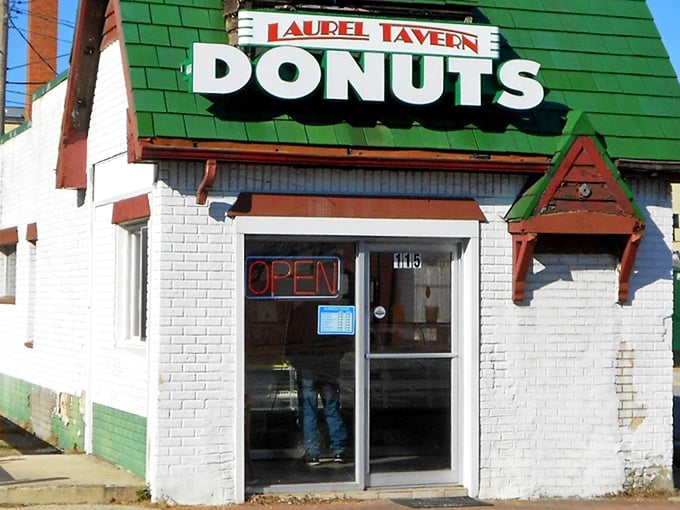 Laurel Tavern Donuts' iconic green roof has sheltered generations of donut dreams. Simple building, extraordinary flavors.