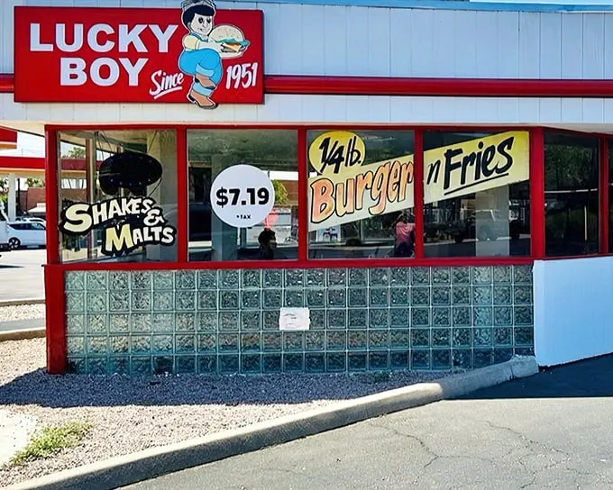 Lucky Boy's vintage storefront screams "American classic" – where milkshakes still require muscle and burgers come with a side of nostalgia.