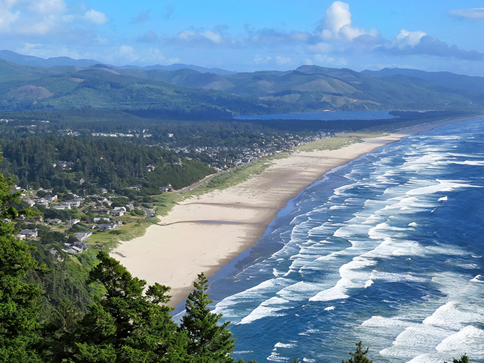 Manzanita: The Oregon coast's best-kept secret reveals itself from above – a perfect crescent beach nestled between mountain and sea.