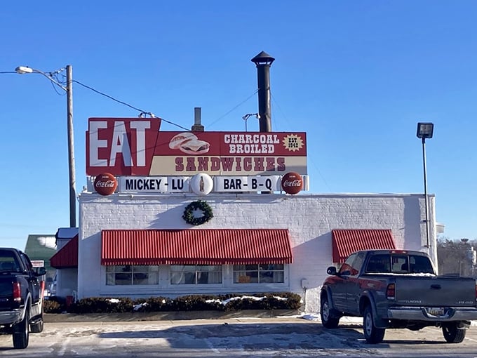 Mickey-Lu's bold "EAT" sign isn't just a suggestion—it's the best advice you'll get all day. Those charcoal-grilled burgers are worth every mile of the drive.