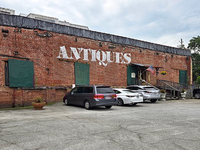 This brick beauty houses Payne Mill Village Antiques, where history seeps through the walls. The "ANTIQUES" sign promises adventures within.
