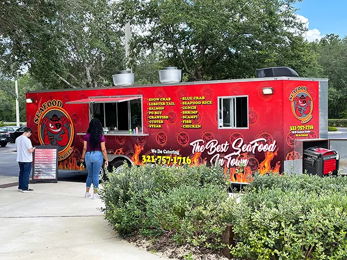 Seafood Bandits' fiery red truck is like a beacon for seafood lovers – bold, unapologetic, and promising flavors that'll make you an accomplice to deliciousness.