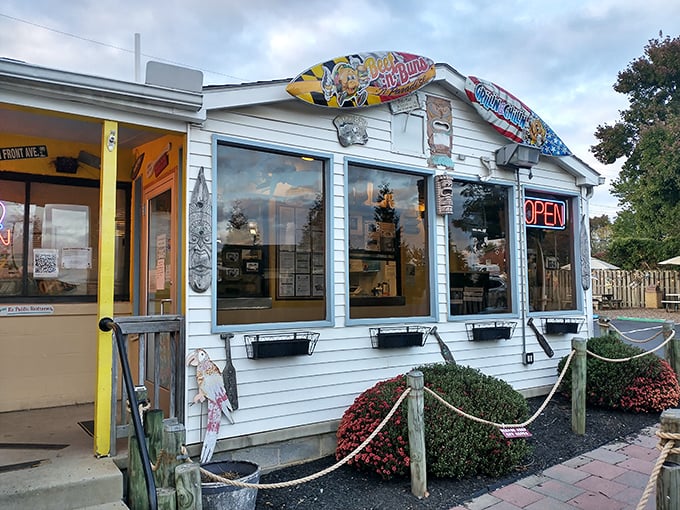 This cheerful shack could be the setting for a Jimmy Buffett song. The nautical ropes and weathered wood scream "vacation vibes."