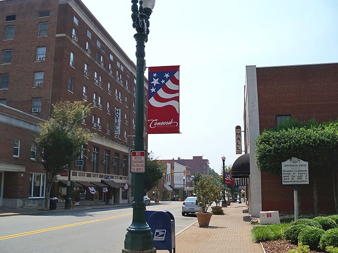 Patriotic banners wave along Concord's welcoming streets, where Southern hospitality isn't just a saying, it's a way of life.