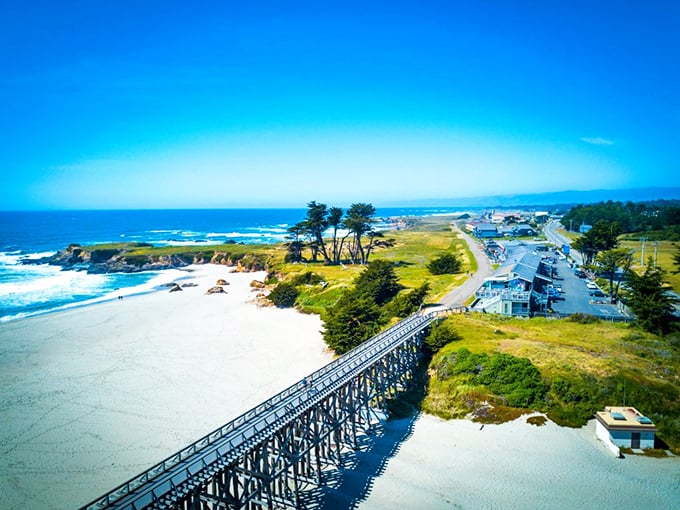 This coastal gem sparkles like nature's own jewelry box, with that perfect bridge connecting land to endless possibilities.