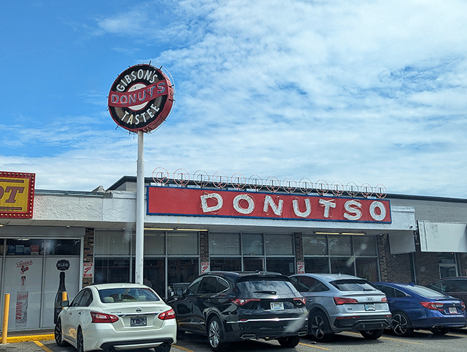 The "DONUTS" sign doesn't whisper, it shouts—and locals answer the call. Memphis mornings don't officially start until Gibson's says so.