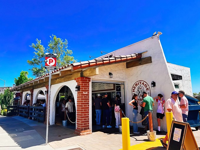 White walls, wooden beams, and a crowd that knows waiting for great BBQ is like waiting for Christmas morning—absolutely worth it.