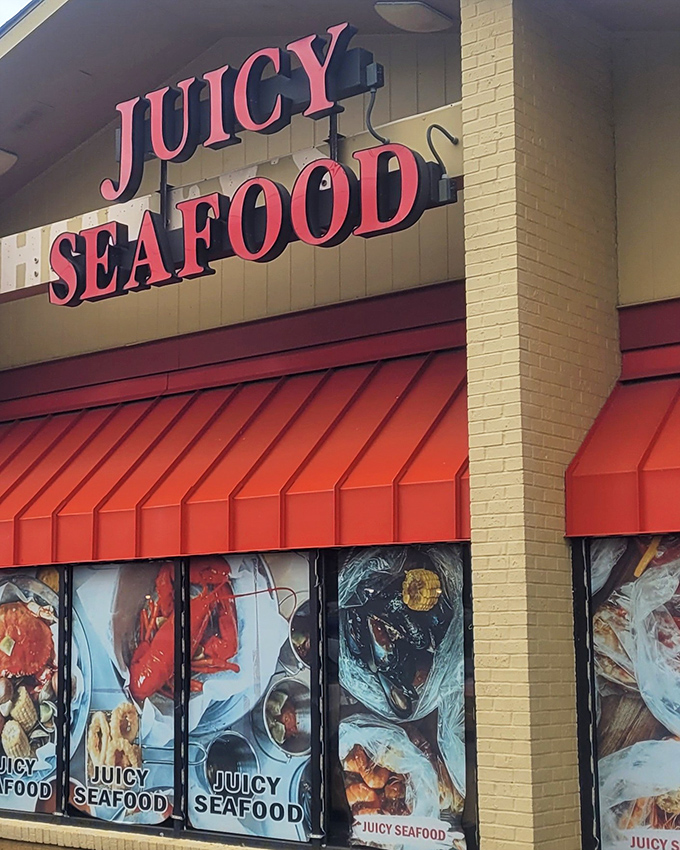 Those window displays at Juicy Seafood aren't just for show—they're a delicious preview of the butter-drenched treasures waiting inside.