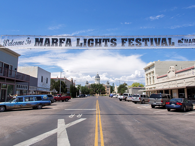 The Marfa Lights Festival banner welcomes visitors to a town where art meets mystery under vast Texan skies.
