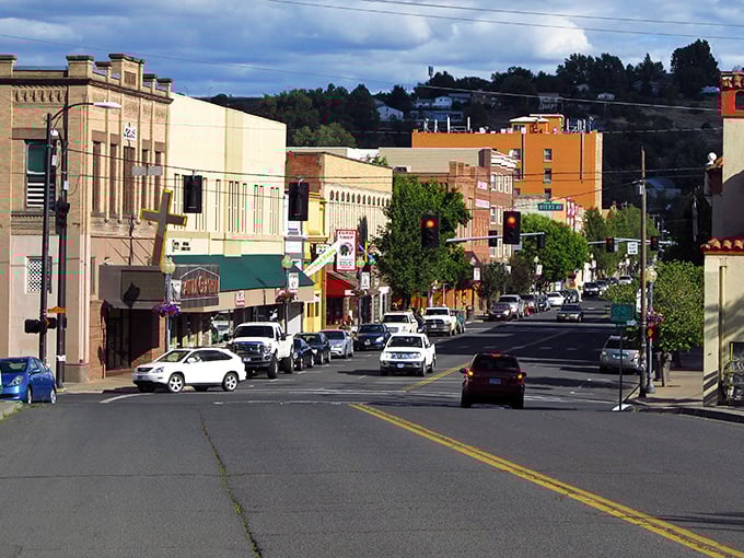 "Main Street, USA with a Western twist! Those brick buildings have probably witnessed more cowboy stories than a John Wayne marathon."