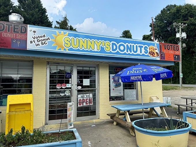That cheerful yellow exterior practically radiates sunshine – and probably amazing glazed donuts too.
