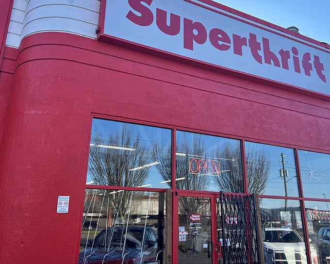 The bright red SuperThrift building isn't subtle about its mission—it practically shouts "Come find your next favorite thing!"