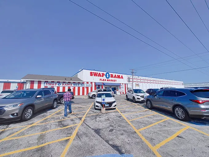 Parking lot packed with possibility! Shoppers flock to Alsip's Swap-O-Rama, where every visit is a new adventure.