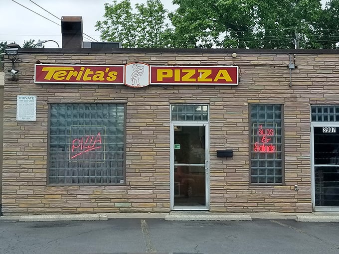 The simple storefront design lets the pizza do all the talking, and boy, does it have stories to tell.
