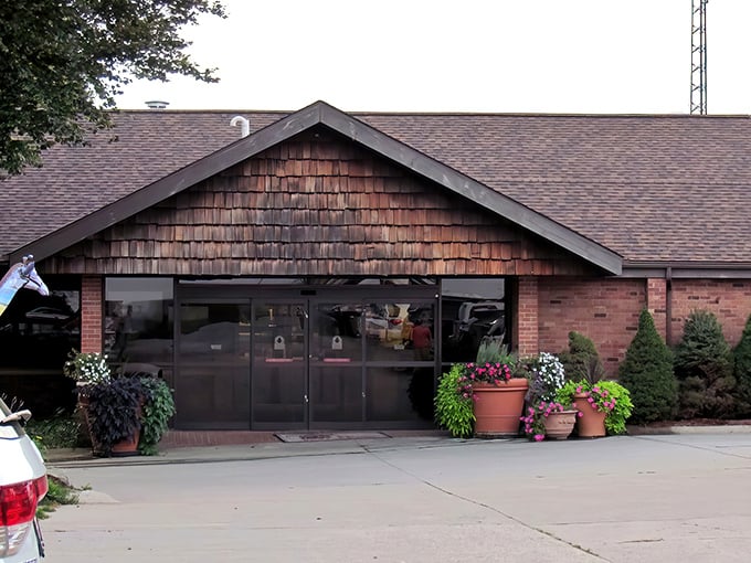 Those colorful flower pots aren't just for show—they're your first clue that The Beef House cares about the details.