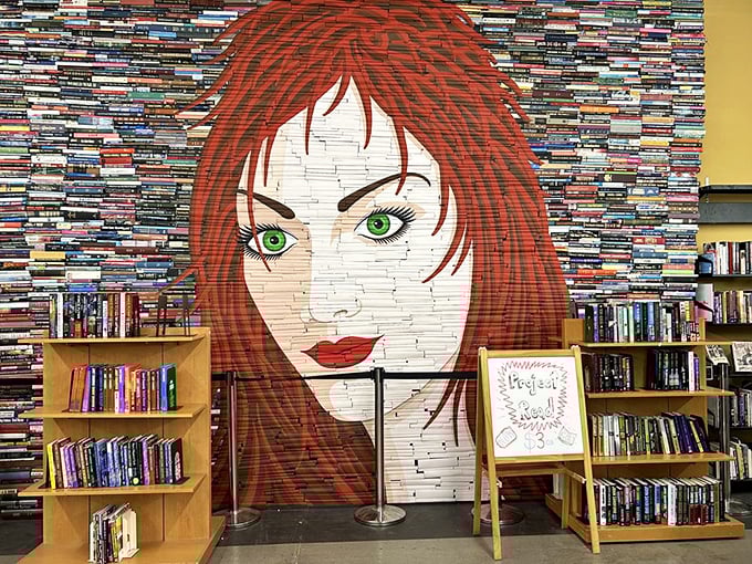 A face emerges from thousands of book spines, proving that libraries aren't just about reading – they're living art installations waiting to happen.
