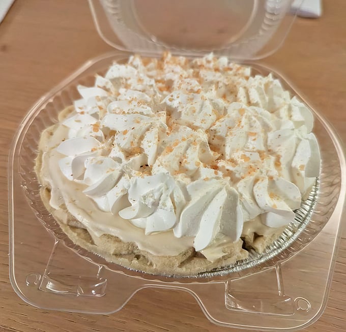 This cream pie isn't just dessert—it's a cloud of happiness with a crust. The whipped topping practically demands a moment of respectful silence.