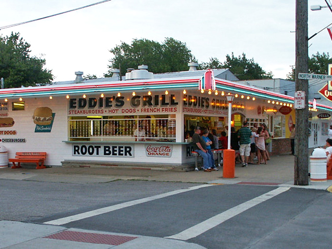 Eddie's Grill hasn't changed its recipe for summer happiness since your first crush—root beer in frosty mugs and the symphony of sizzling burgers.