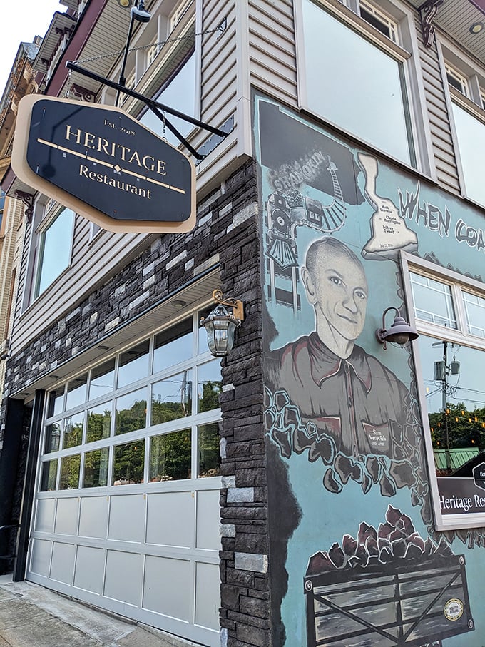 Heritage Restaurant pairs local history with comfort food classics. That mural tells stories the menu can't – both worth savoring.