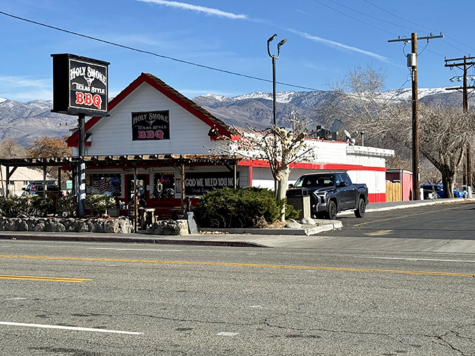 Holy Smoke BBQ isn't just a name—it's what you'll exclaim after tasting their Texas-style brisket with those majestic mountains providing the perfect dining backdrop.