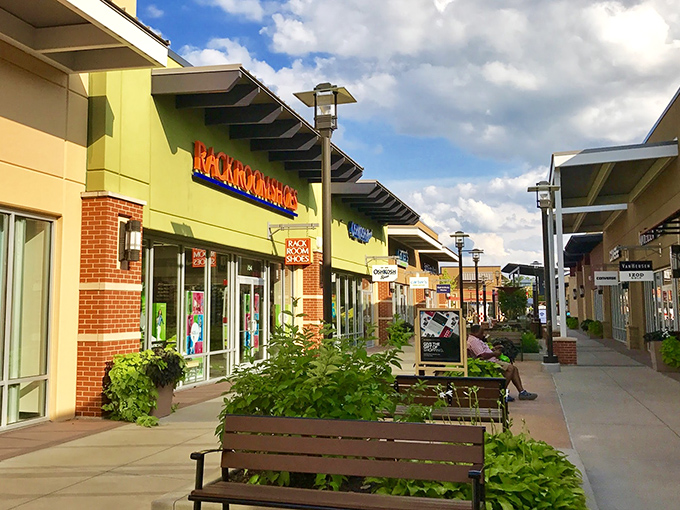 Not your grandmother's strip mall! The thoughtfully designed walkways and colorful storefronts create an inviting atmosphere for serious bargain hunters.