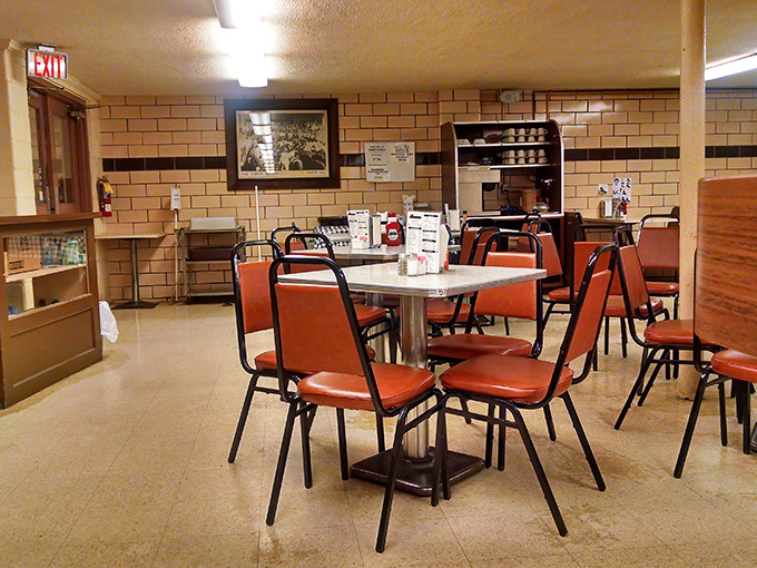 Simple orange chairs and cream-tiled walls create the perfect stage for breakfast theater. No tickets required, just an appetite.