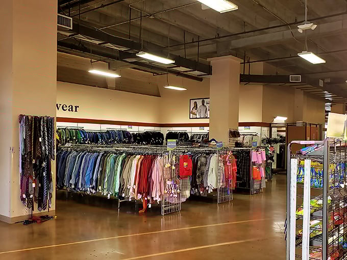 Racks organized by color rather than designer—a refreshing democracy where a Target tee might hang beside an Armani blouse.
