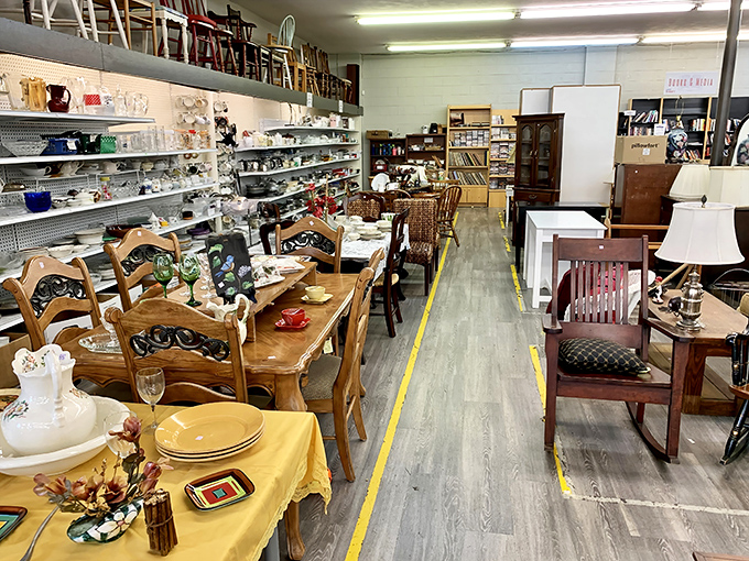 Dining sets and dishware line this aisle like a furniture museum where everything has a "Take Me Home" sign.