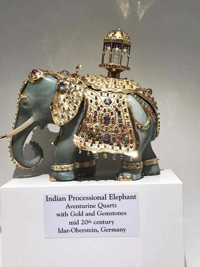 This bejeweled elephant isn't just showing off—it's a masterclass in lapidary artistry, with aventurine quartz forming the perfect canvas for gold and gemstone adornments.