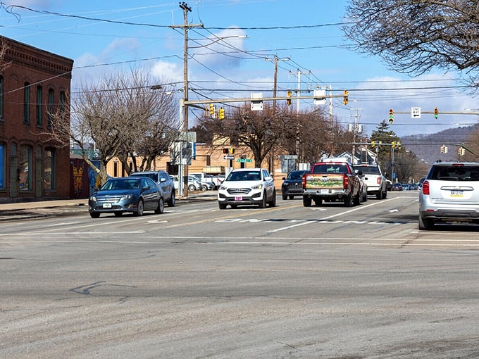 The intersection of past and present – where historic architecture meets modern life, and everyone still waves at passing cars.
