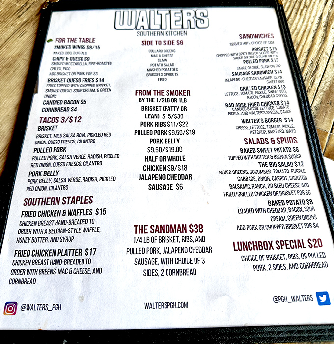 This menu isn't just a list—it's a roadmap to happiness. The "Sandman" with brisket, ribs, and pulled pork is basically the Avengers of meat.