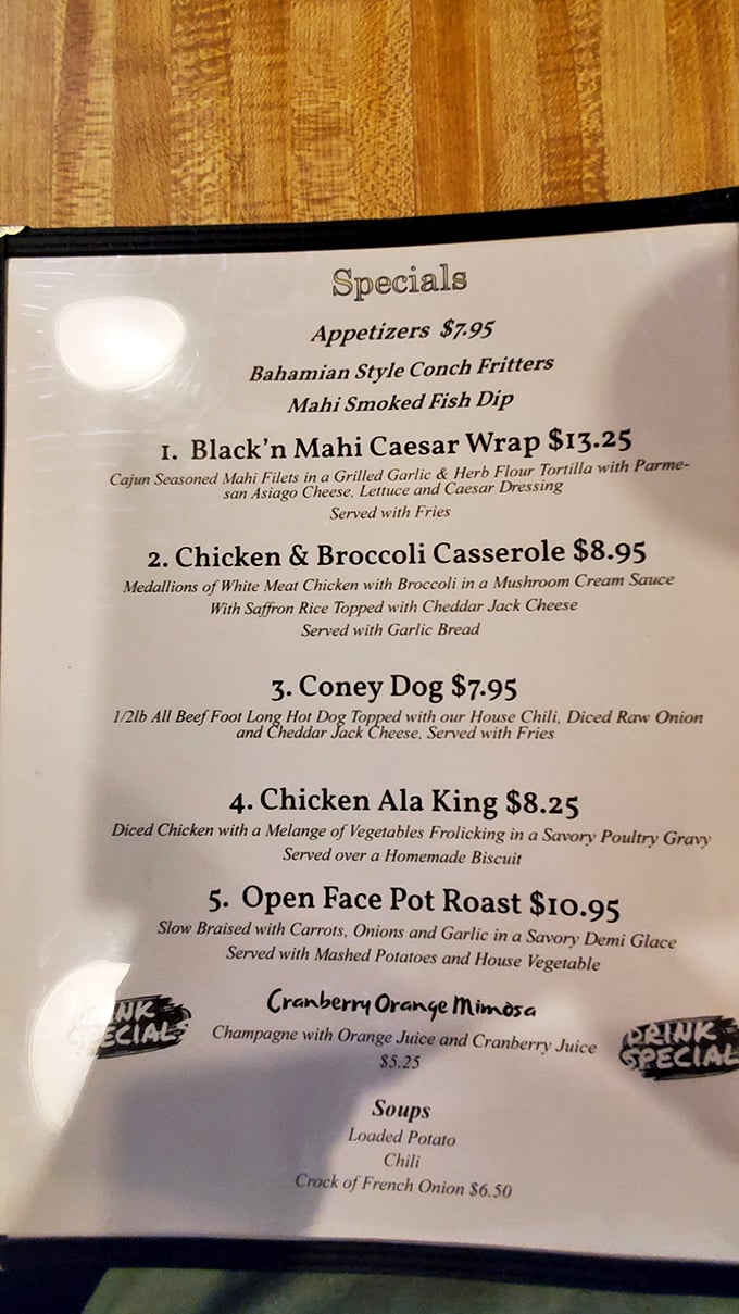 A menu that reads like a love letter to comfort food. Those "vegetables frolicking in savory gravy" had me at hello.