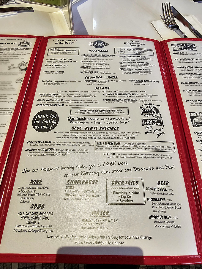 A menu that reads like a greatest hits album of American comfort food. No QR codes here—just laminated pages of timeless classics waiting to be rediscovered.