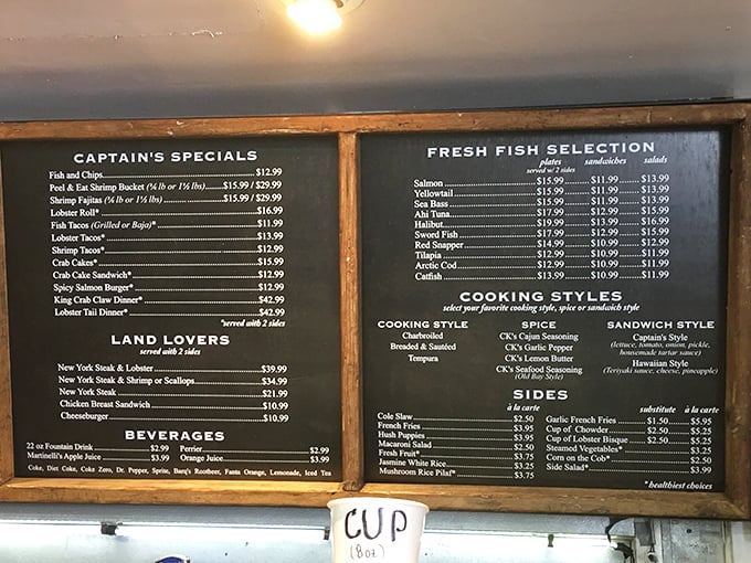 A menu board that doesn't need fancy fonts or photos—just the straight talk of fresh catches and cooking styles that let quality shine.