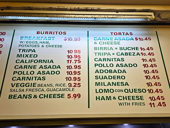 The menu board at Tacos El Panson reads like a greatest hits album of Mexican street food classics, each one a potential life-changing experience.