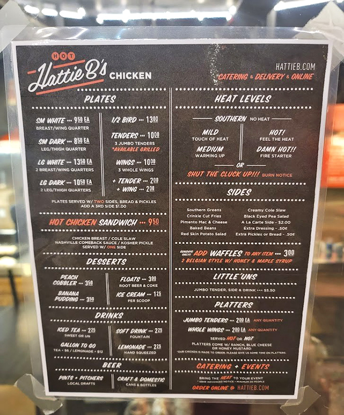 This isn't just a menu—it's a heat index chart for your culinary adventure. "Shut the Cluck Up!!!" isn't a suggestion, it's a prediction.