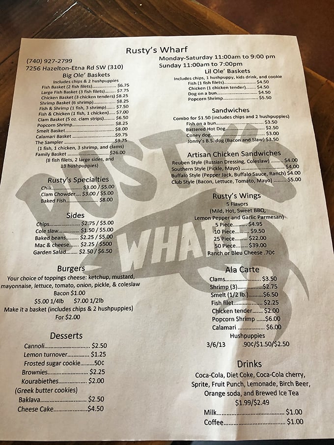 A menu that reads like seafood poetry—simple, direct, and promising delights from both land and sea without fancy culinary jargon.