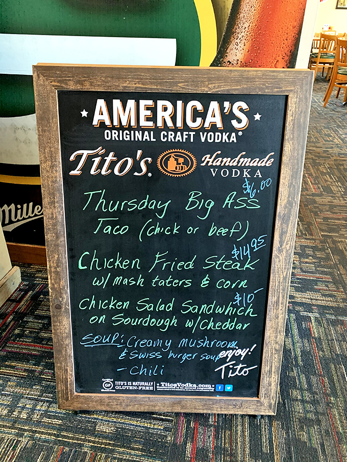 Thursday's specials board promises comfort food glory. That "Big A** Taco" isn't just a name—it's a commitment.