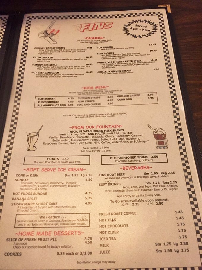 This menu isn't just food—it's a manifesto of comfort. From thick shakes to burgers, Fins proves paradise can indeed be found on laminated paper.