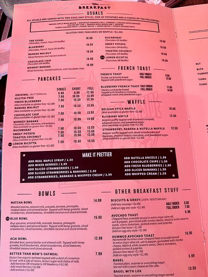 A pink menu that reads like a love letter to every breakfast dream you've ever had. 