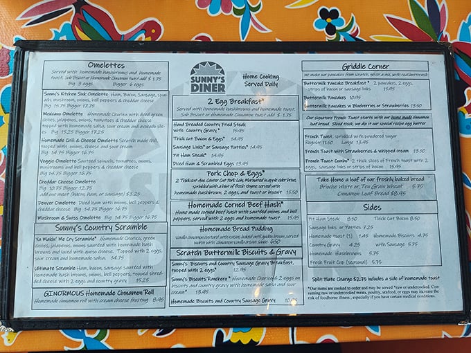 This menu isn't just reading material—it's a roadmap to happiness. The "ENORMOUS" cinnamon roll isn't false advertising, trust me.