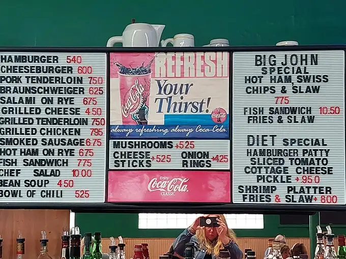 This menu board is like the Constitution of comfort food—straightforward, enduring, and guaranteeing your right to pursue happiness through cheeseburgers. 