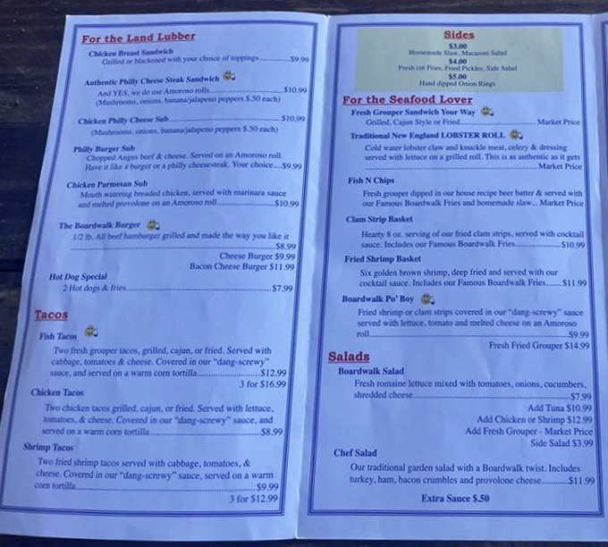 A menu that reads like coastal poetry – from "Land Lubber" options to seafood treasures that make deciding almost painfully difficult.