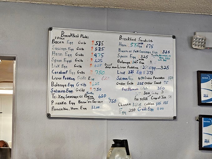 The handwritten whiteboard menu tells you everything you need to know: this place prioritizes cooking over calligraphy, and we're all better for it.