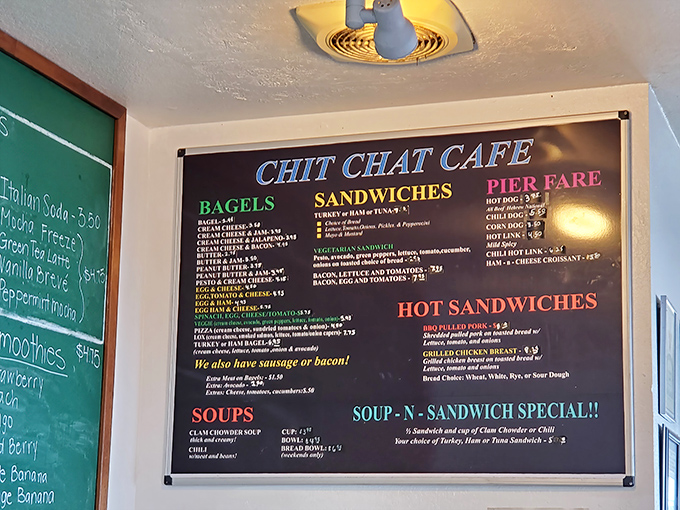 The menu board tells the real story—no fusion confusion or deconstructed nonsense here, just honest sandwiches, bagels, and comfort food that feeds both body and soul.