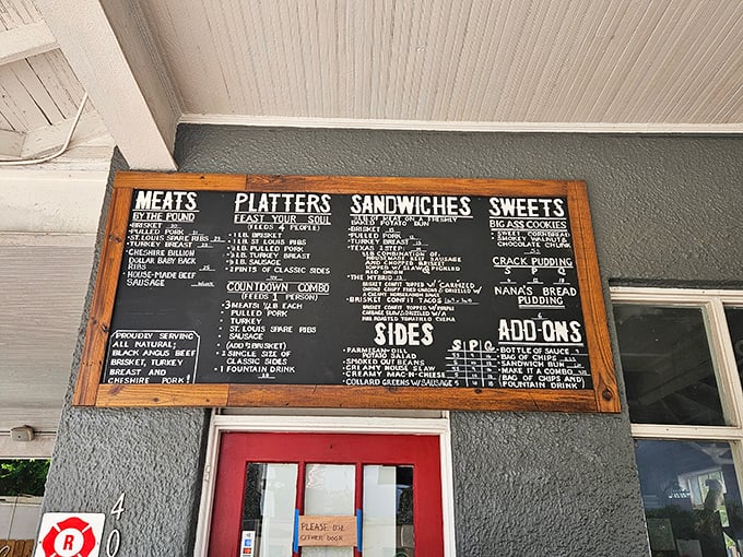 The chalkboard menu tells you everything you need to know: they're here to "feast your soul" with smoked meats done right.