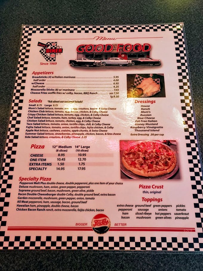 The checkerboard-bordered menu doesn't need fancy fonts to announce its intentions—this is comfort food territory where "GOOD FOOD" isn't just a promise, it's a guarantee.