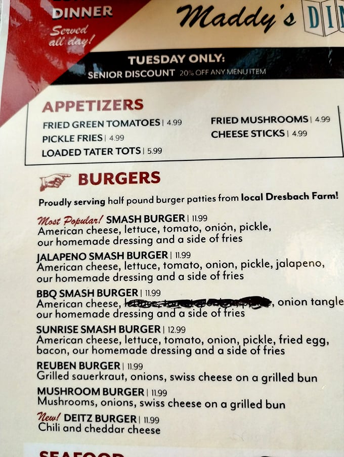 The menu doesn't mince words: burgers from local farms, senior discounts on Tuesdays, and appetizers that don't pretend to be anything but delicious. 
