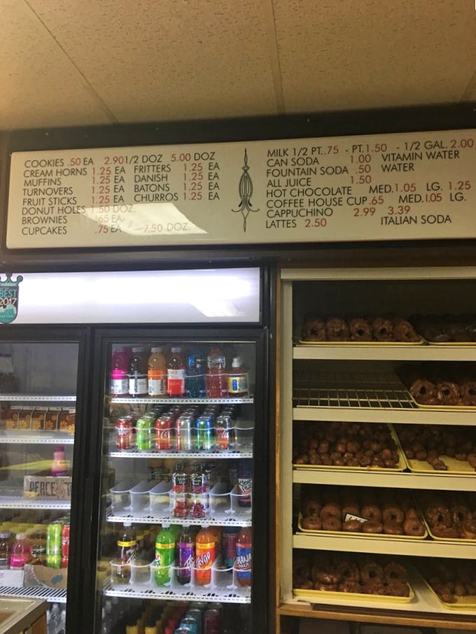 The menu board—a roadmap to happiness. Simple pleasures listed in plain sight, no fancy descriptions needed.